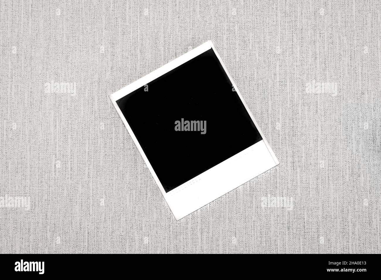 Photo polaroid empty placed on a grey background Stock Photo - Alamy