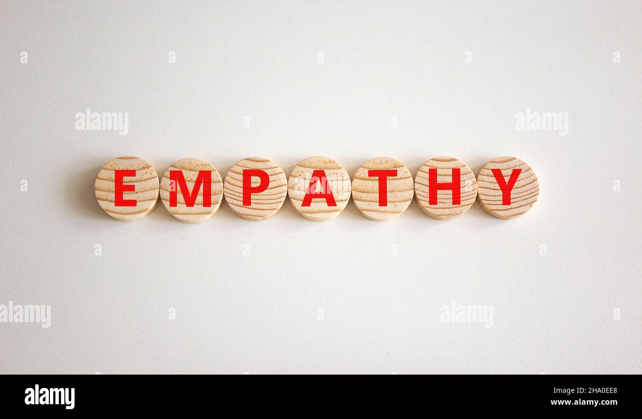 Empathy symbol. The concept word Empathy on wooden circles. Beautiful ...