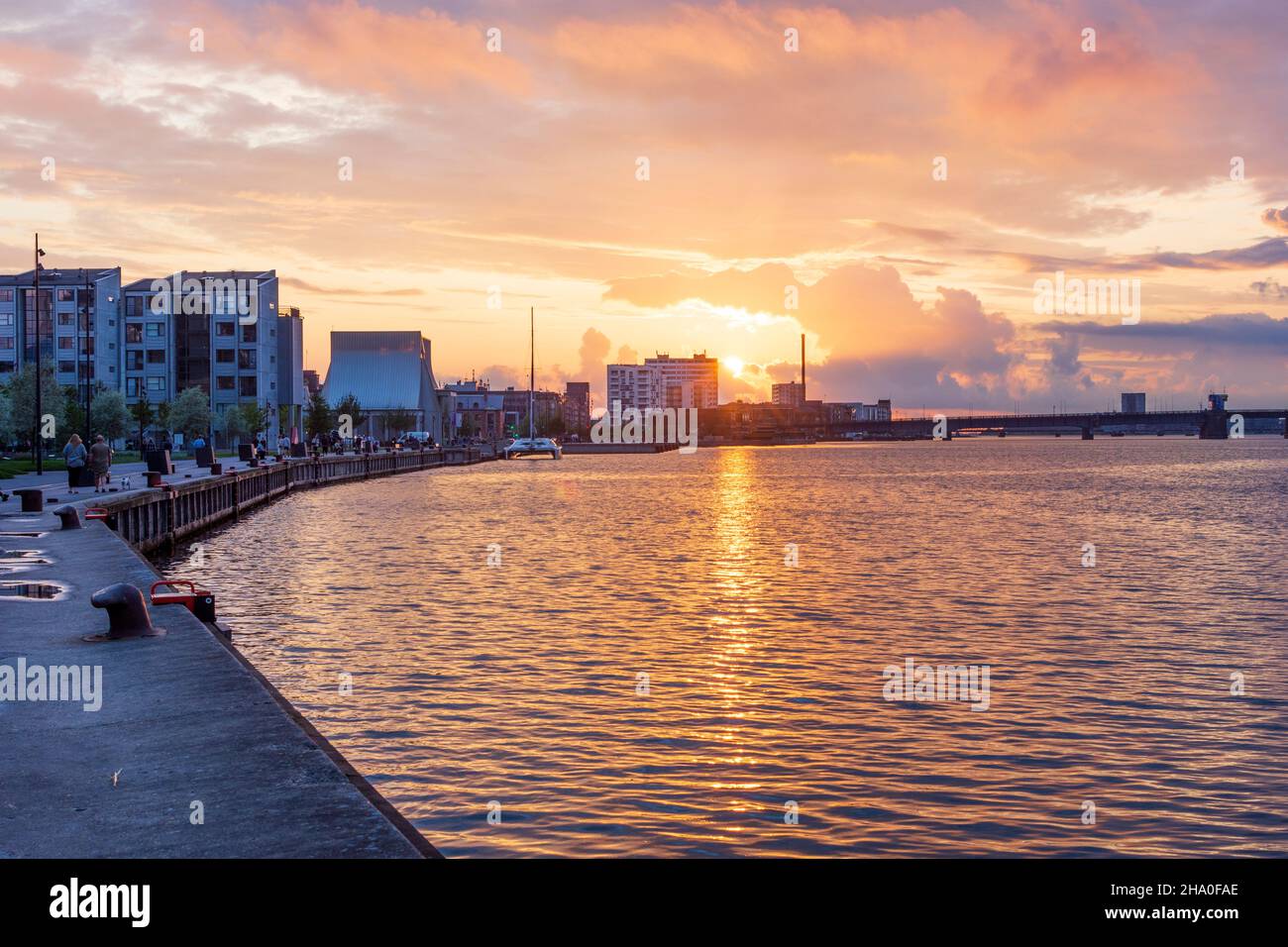 Aalborg: waterfront at Limfjord, view to Utzon Center, sunset, in ...