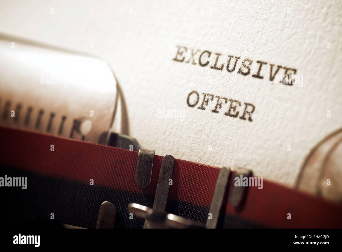 Exclusive offer phrase written with a typewriter Stock Photo - Alamy