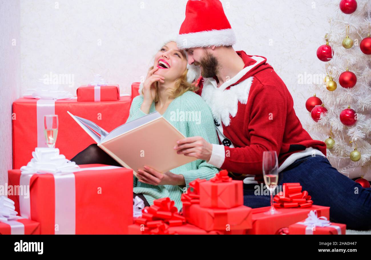 Couple in love enjoy christmas. Happy flashback. Family cuddle near ...