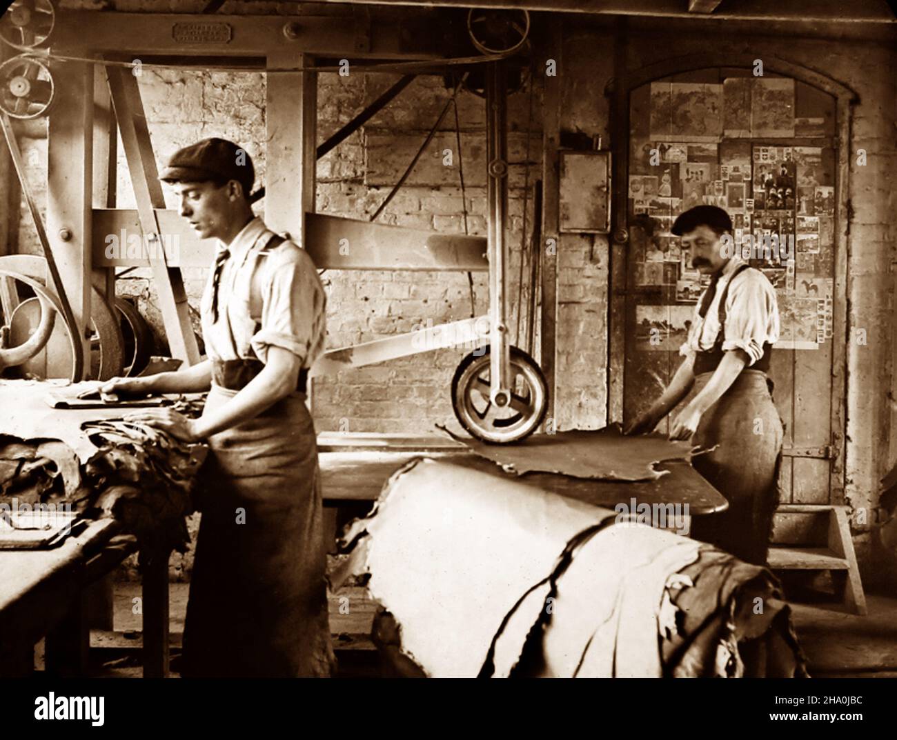Brushing, leather production, Victorian period Stock Photo - Alamy