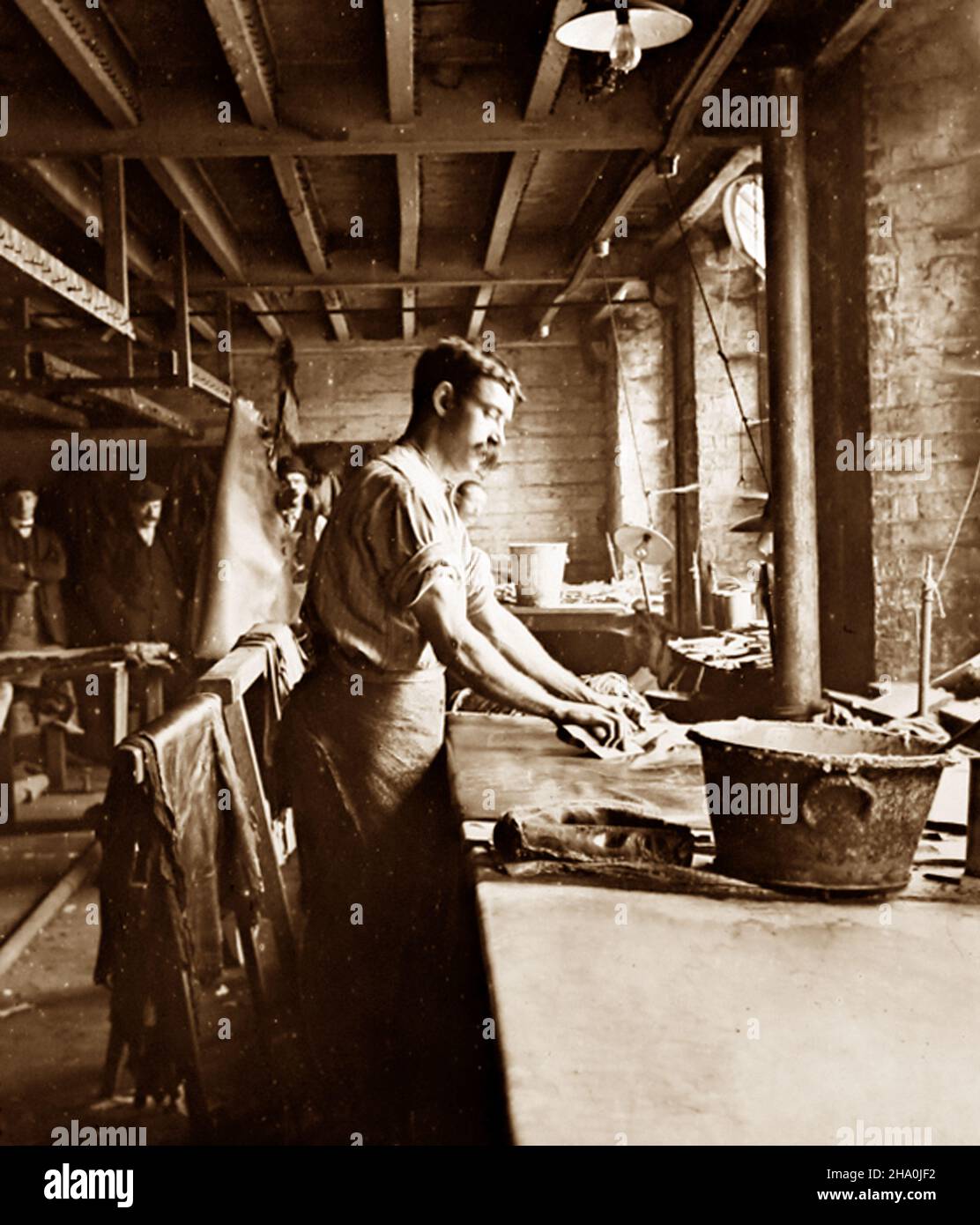 Soaking out colour, leather production, Victorian period Stock Photo ...