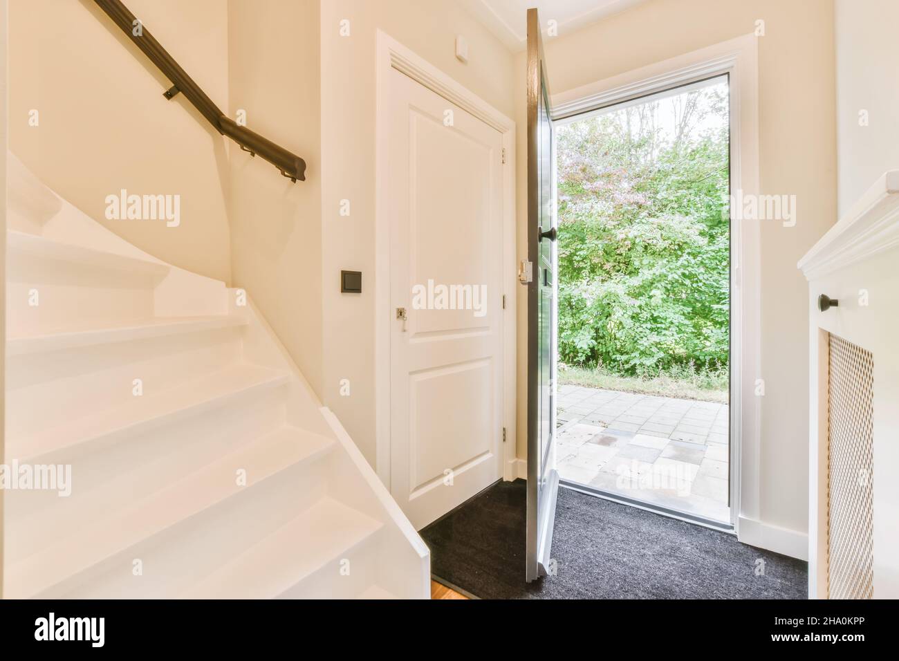 Open front door to the street in elegant house Stock Photo - Alamy