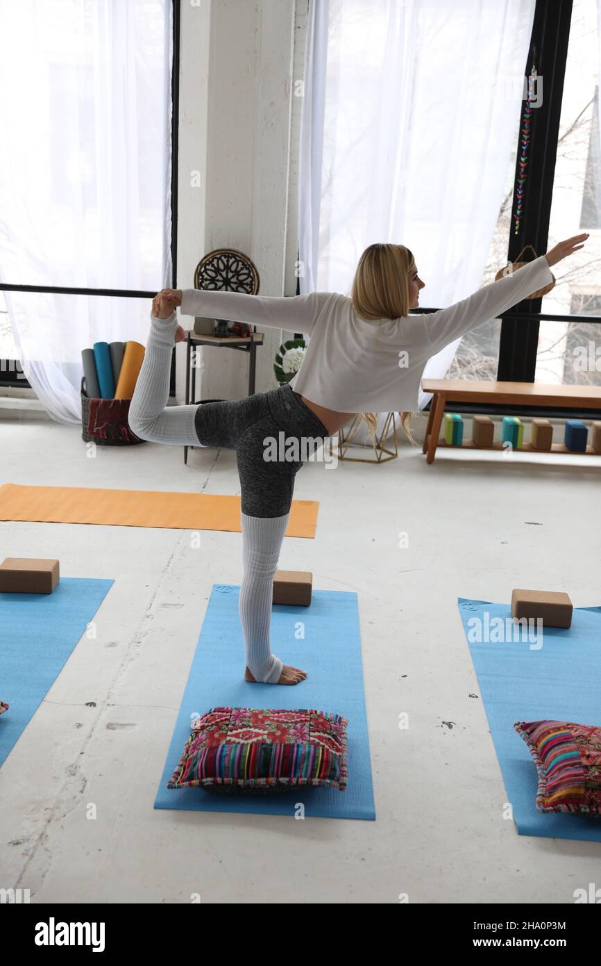 Yoga Model Yoga Posing in Daylight loft studio Chicago Stock Photo - Alamy