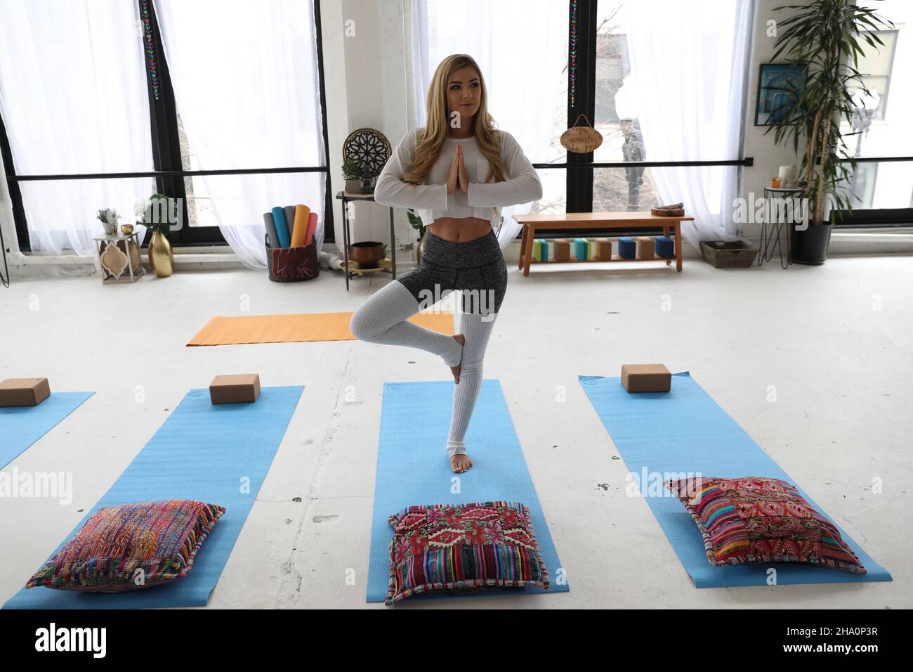Yoga Model Posing in Daylight Yoga Studio Chicago Stock Photo - Alamy
