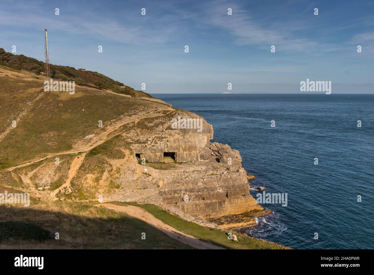 Tilly Whim Caves near Anvil Point lighthouse in Durlston Country Park ...