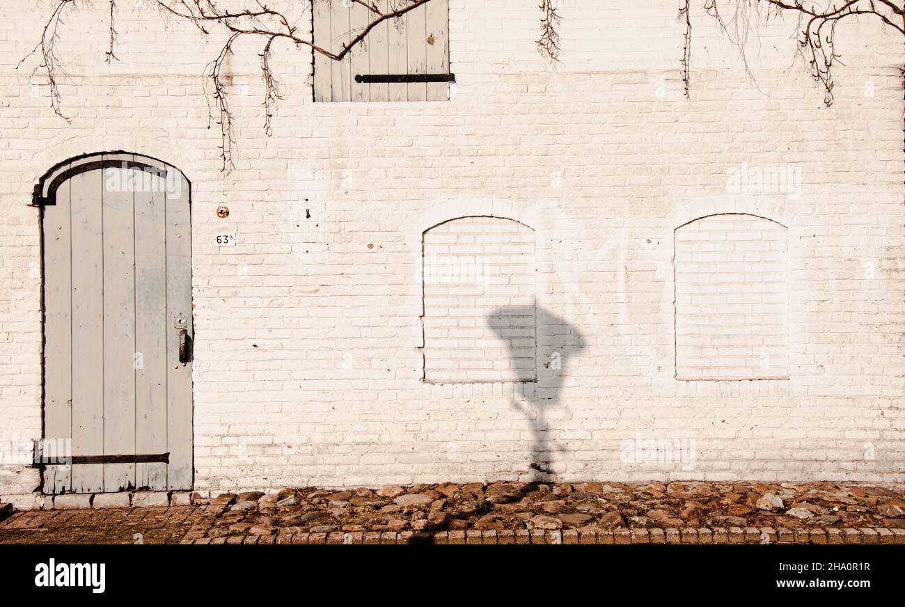 facade of a house with streetlight shadow Stock Photo - Alamy