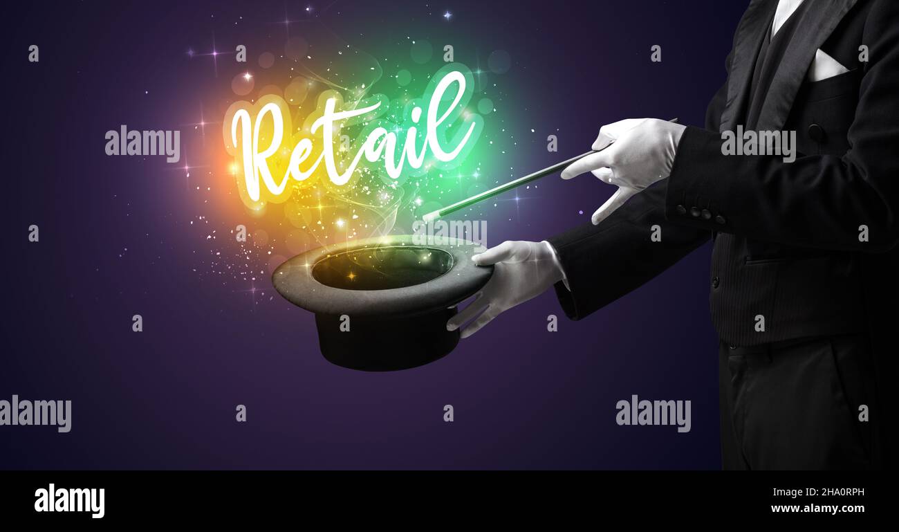 Young magician is showing magic trick Stock Photo - Alamy