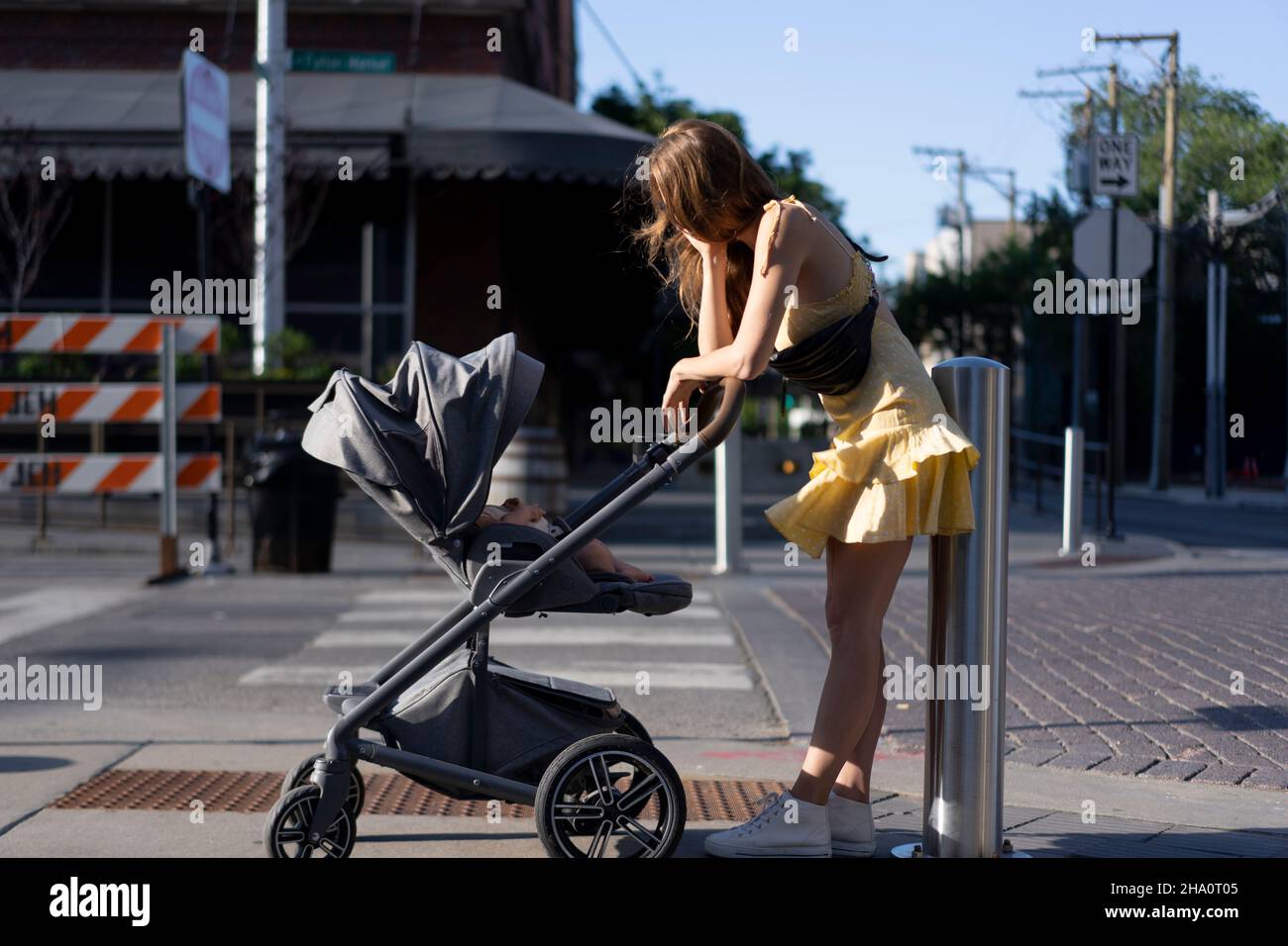 Mom taking a morning walk with a stroller in Chicago Stock Photo - Alamy