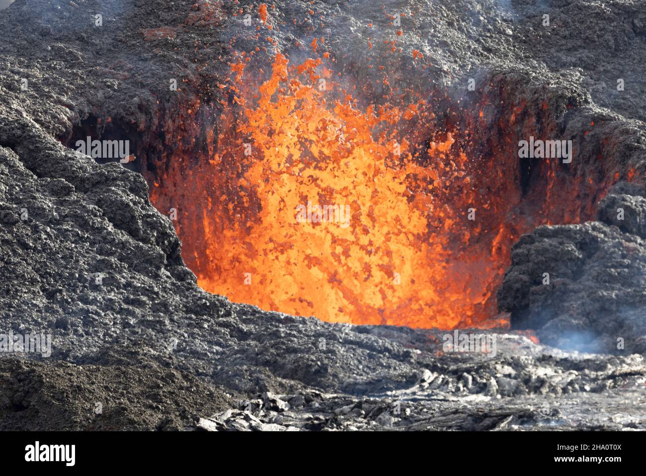 volcano caldera in eruption with lava Stock Photo - Alamy