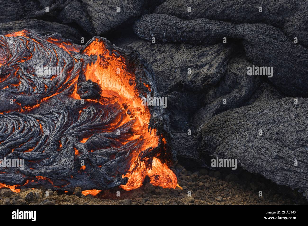 incandescent flowing volcanic lava in volcano Stock Photo - Alamy