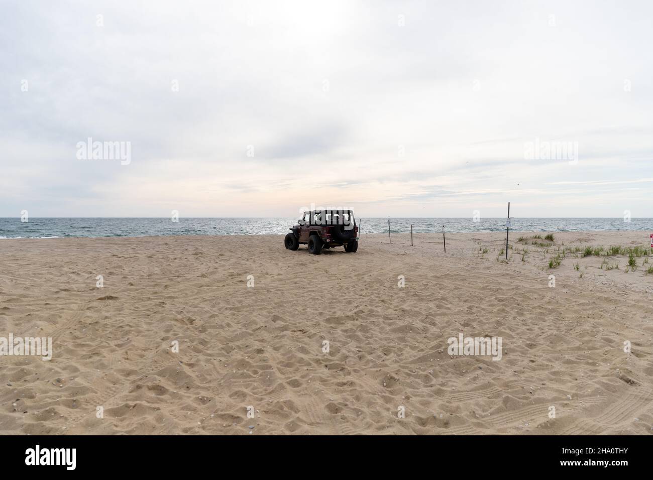Isolated jeep on remote beach in Nantucket Stock Photo - Alamy
