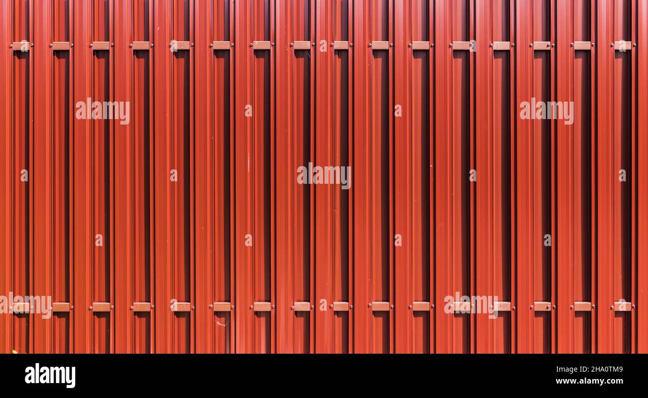 Red steel fence, front view. Background photo texture Stock Photo - Alamy