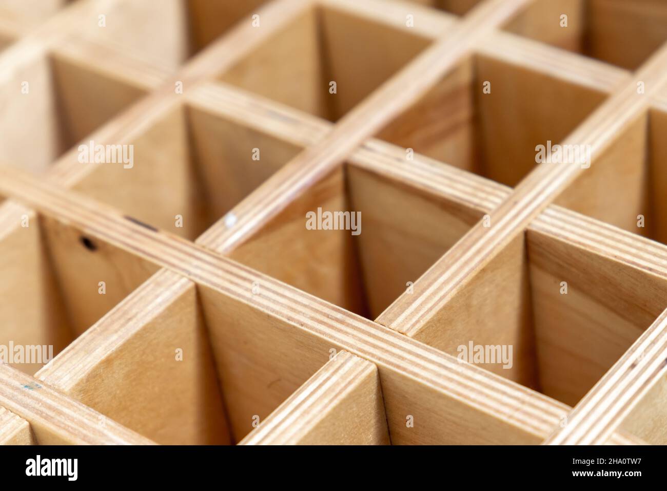 Parametric square cells structure made of uncolored plywood ...