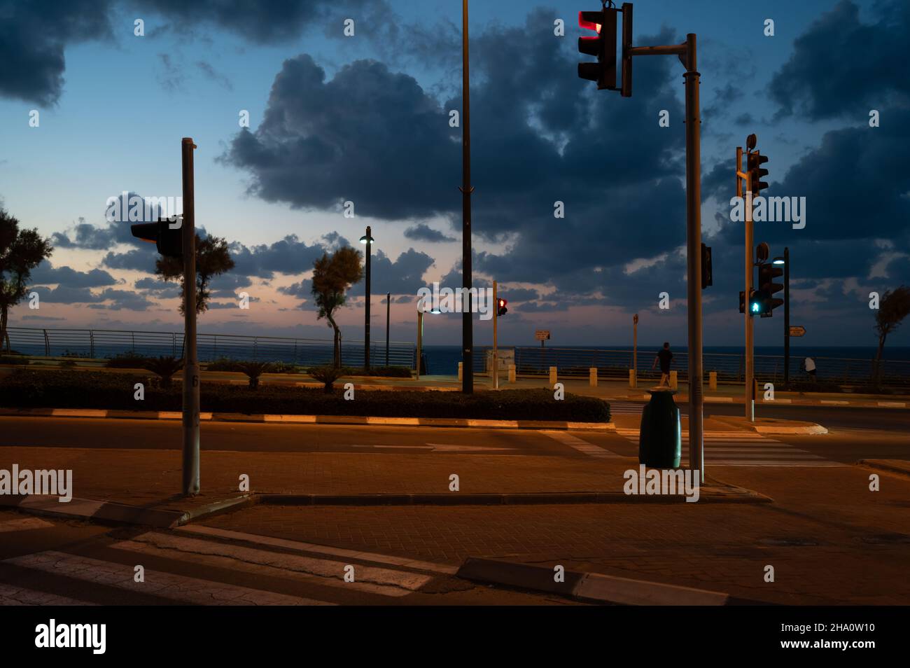 View from the road to the sea with the sunset of Argaman beach in ...