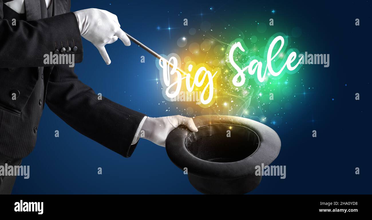 Young magician is showing magic trick Stock Photo - Alamy