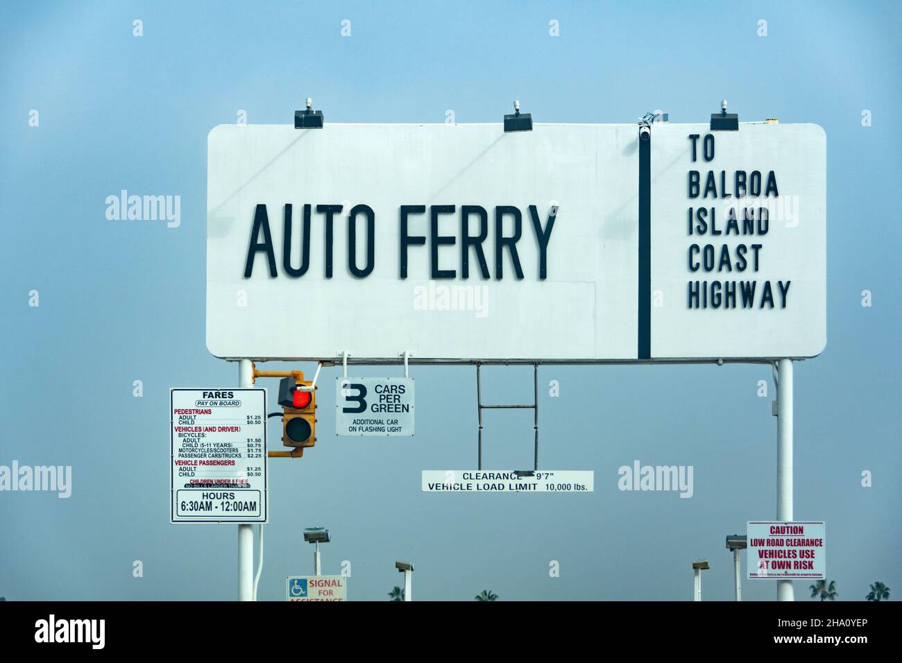 A sign announcing that the Auto Ferry is up ahead. The ferry takes ...
