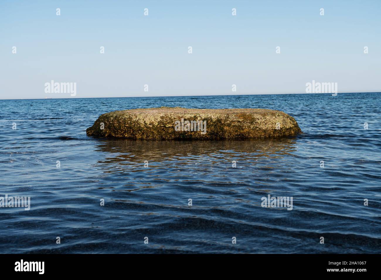 Stone in the sea, stone is washed from all sides, by sea water Stock ...