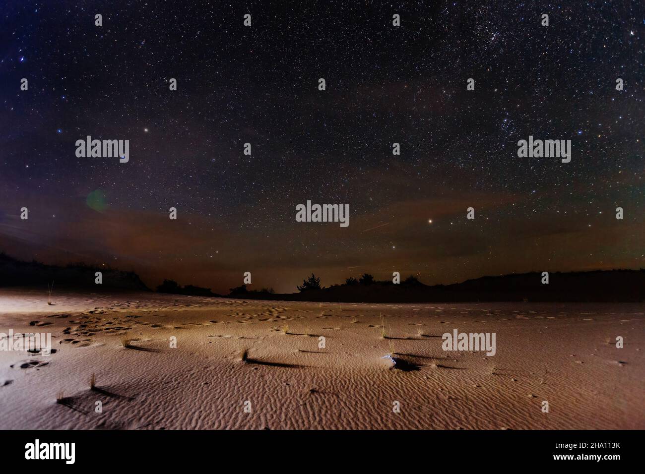 The sandy desert landscape at starry night Stock Photo - Alamy