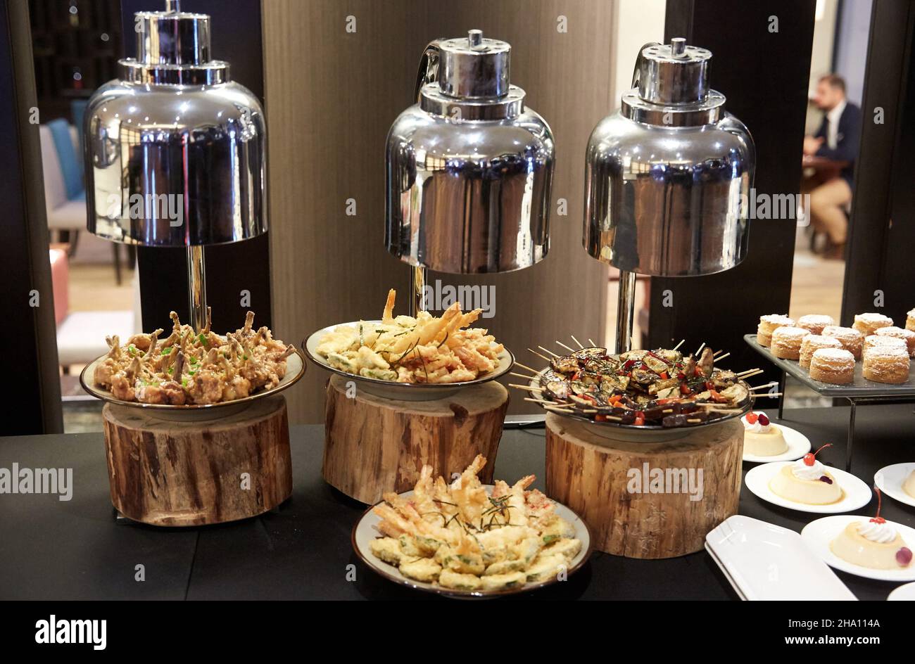 Buffet with various types of dishes in the restaurant Stock Photo - Alamy