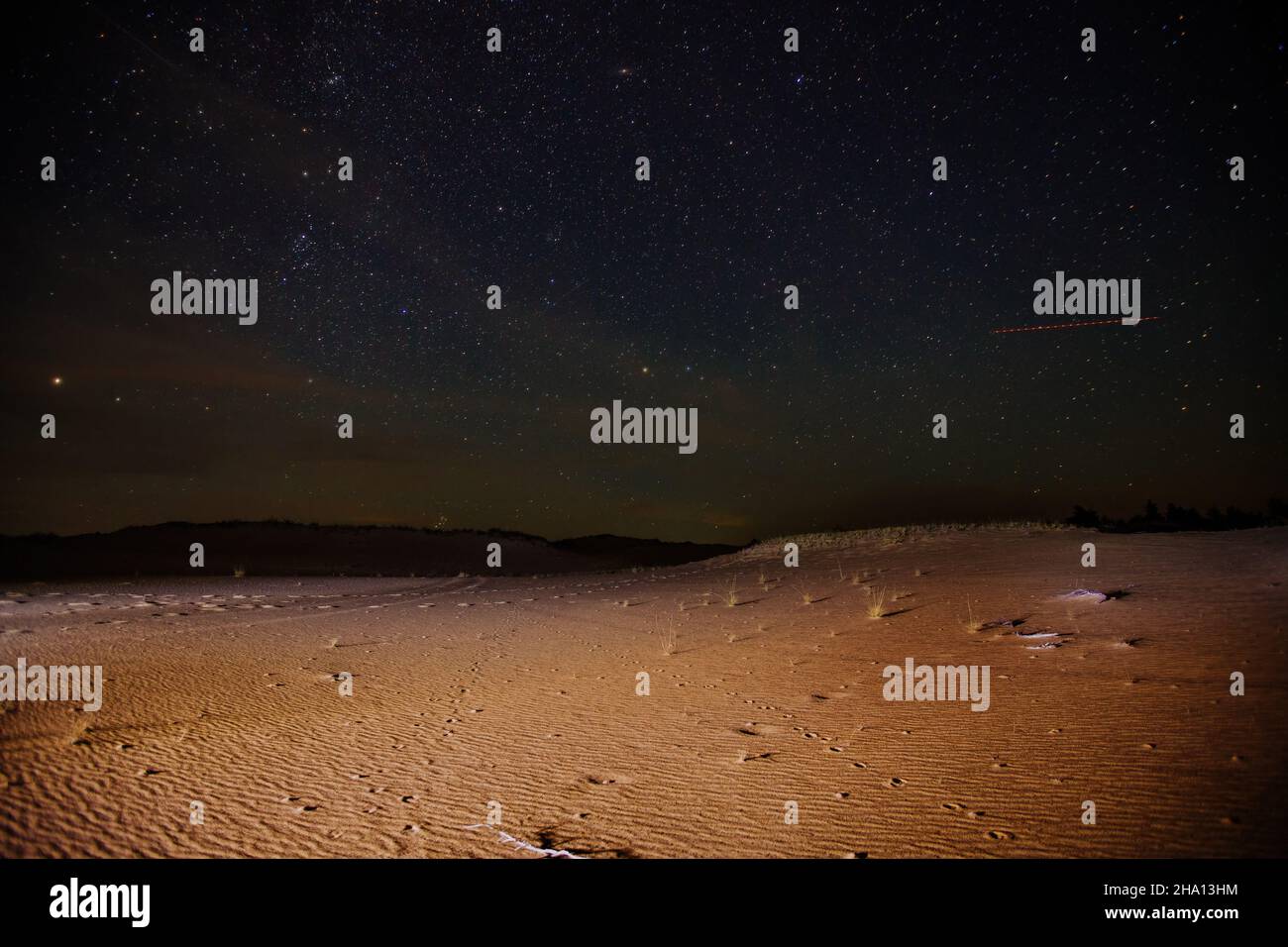 The sandy desert landscape at starry night Stock Photo - Alamy