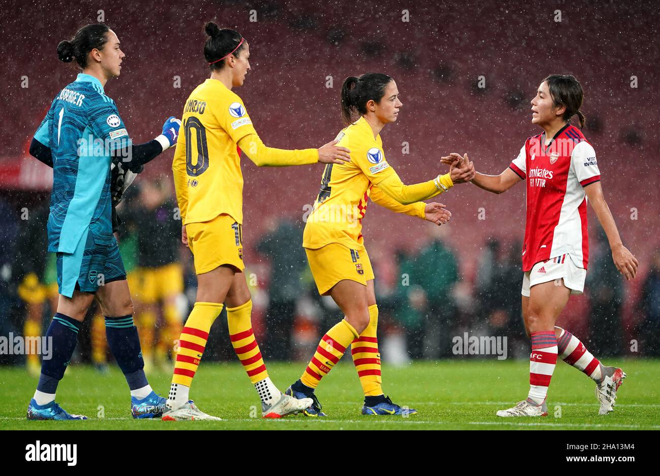 Arsenal's Mana Iwabuchi (right) and Barcelona's Aitana Bonmati shake ...