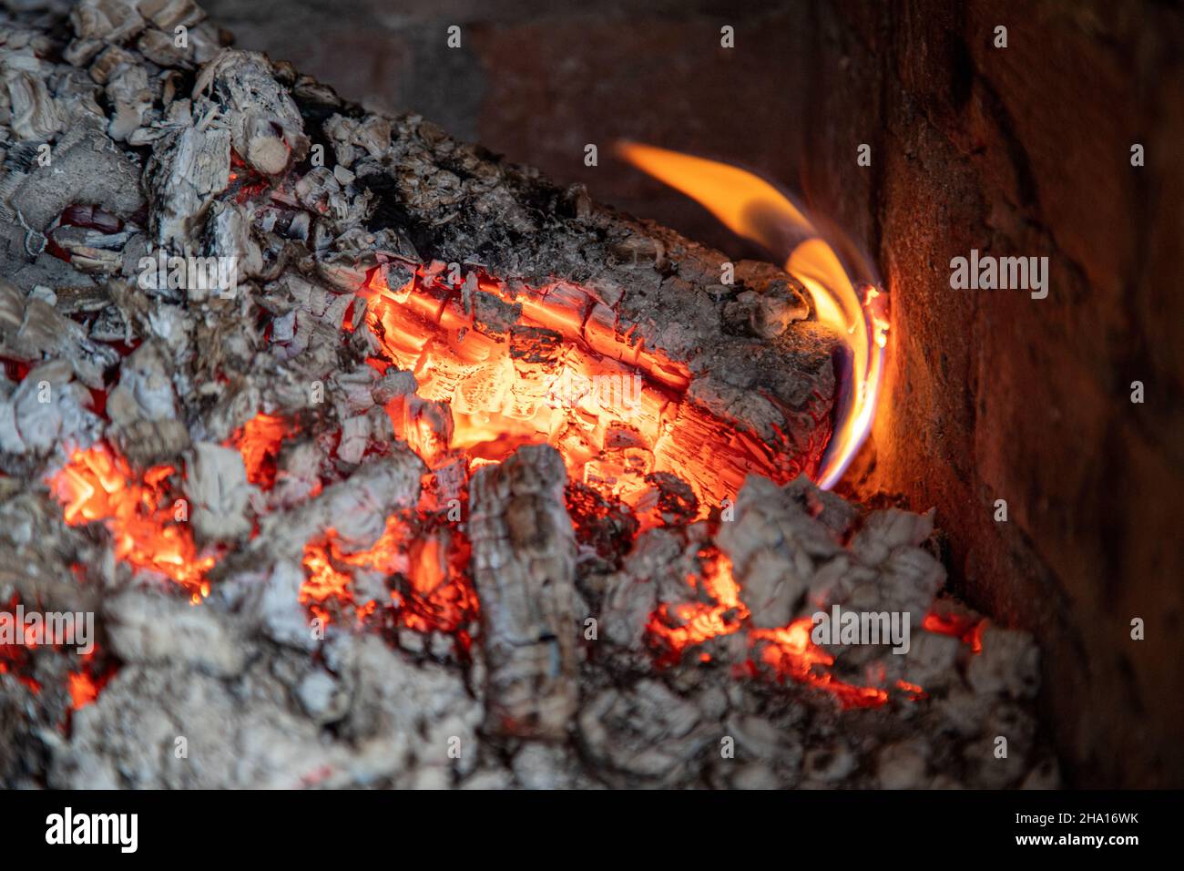 Closeup of burning and flaming hot coal in the fireplace Stock Photo ...