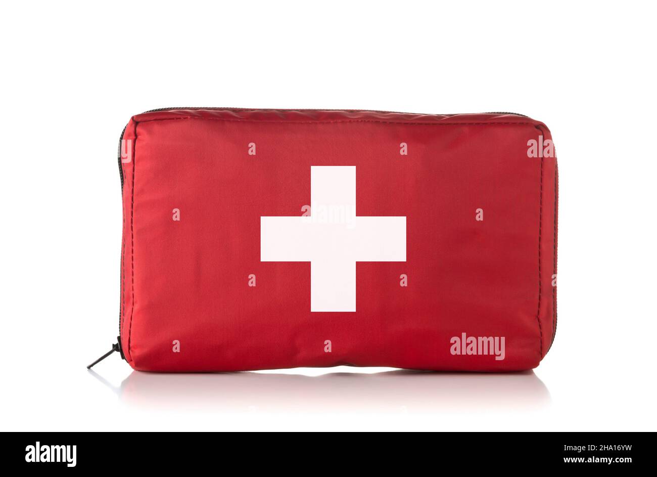 Red first aid medical kit bag standing over white background Stock ...