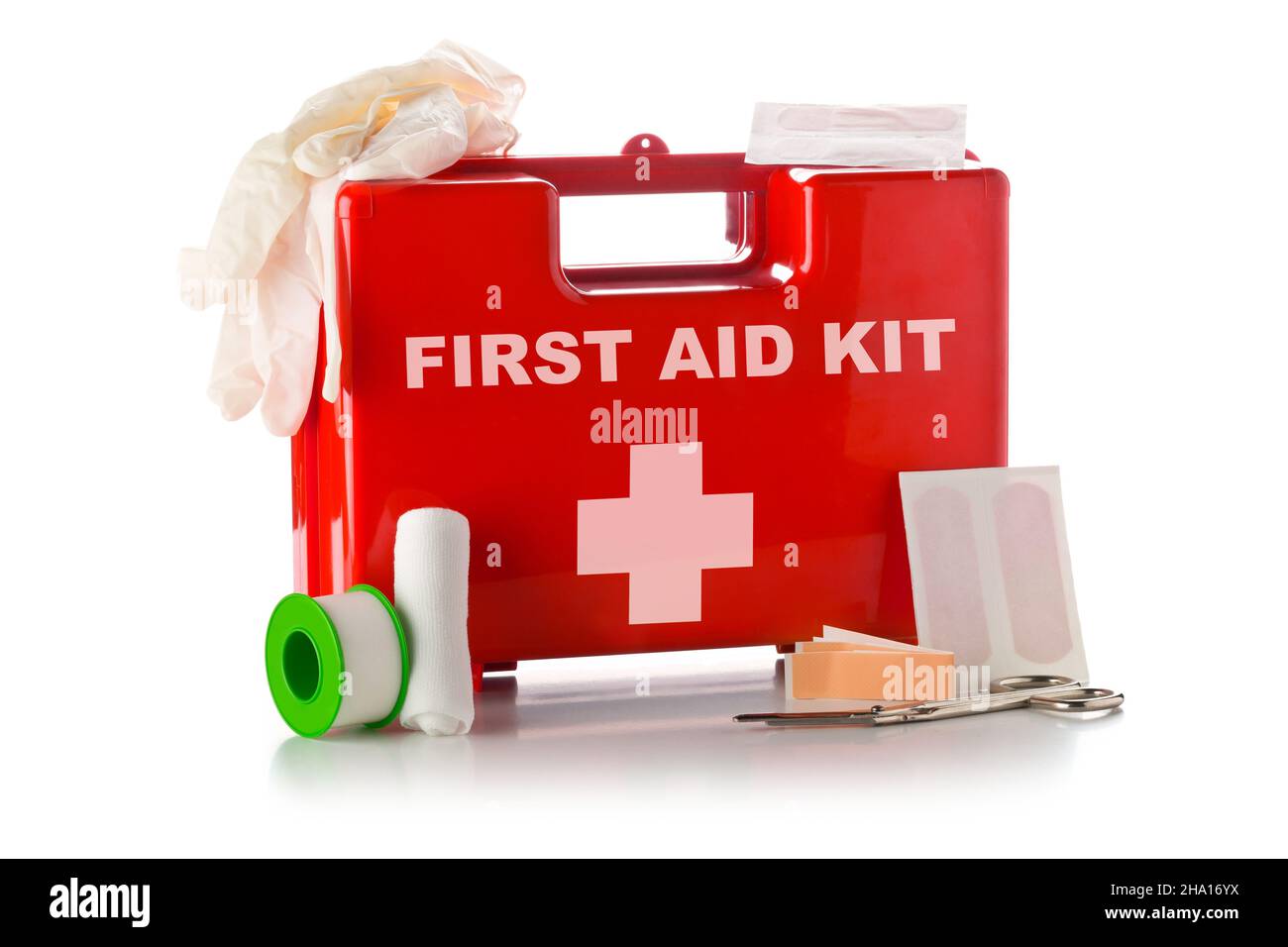 Red first aid medical kit box with scissors, bandage, tape and gloves ...