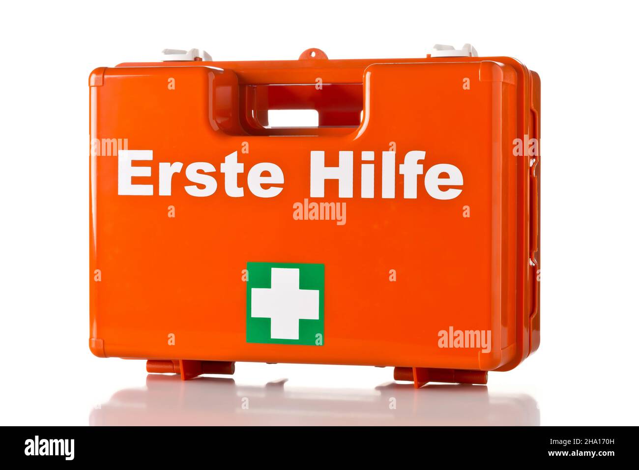 German "Erste Hilfe" (first aid) medical kit box standing over white ...