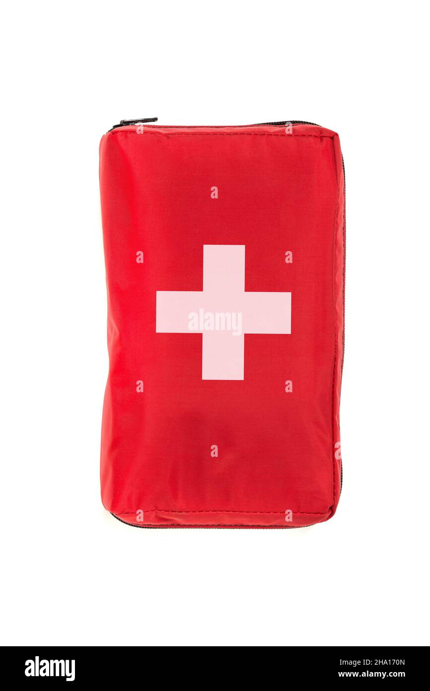 Red first aid medical kit bag over white background flat lay top view ...