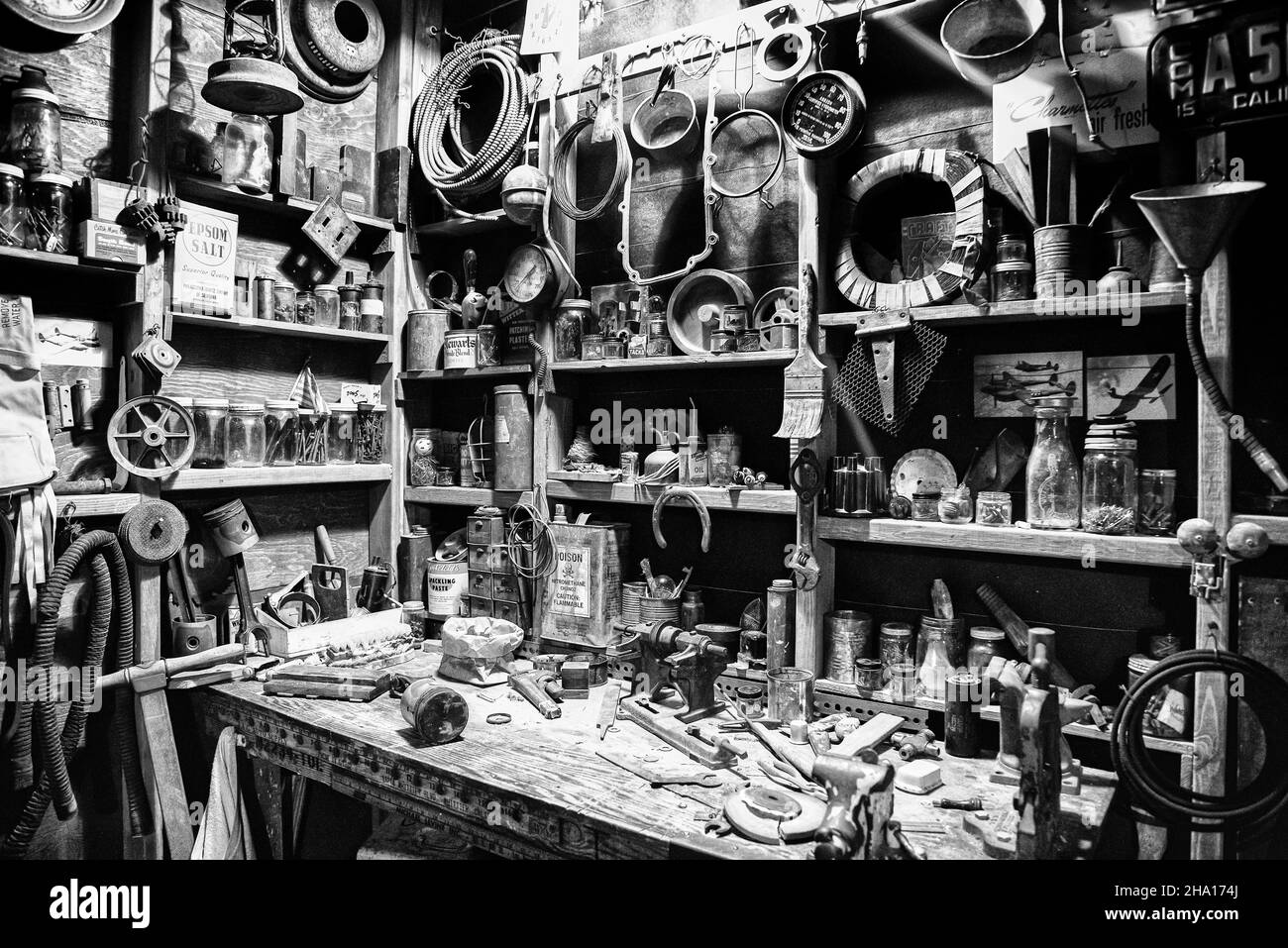 A garage filled with a multitude of tools, hardware and gadgets ...