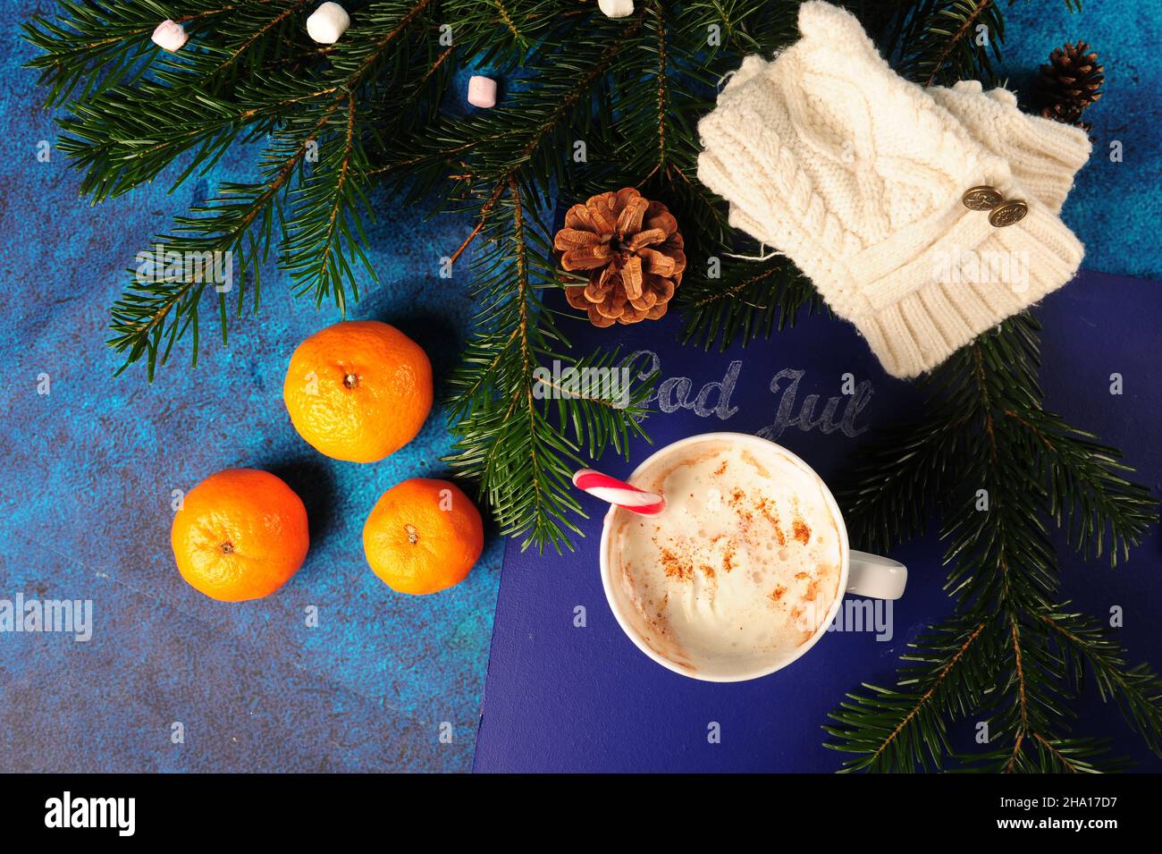 Norwegian god jul Christmas greeting on blue blackboard partially ...