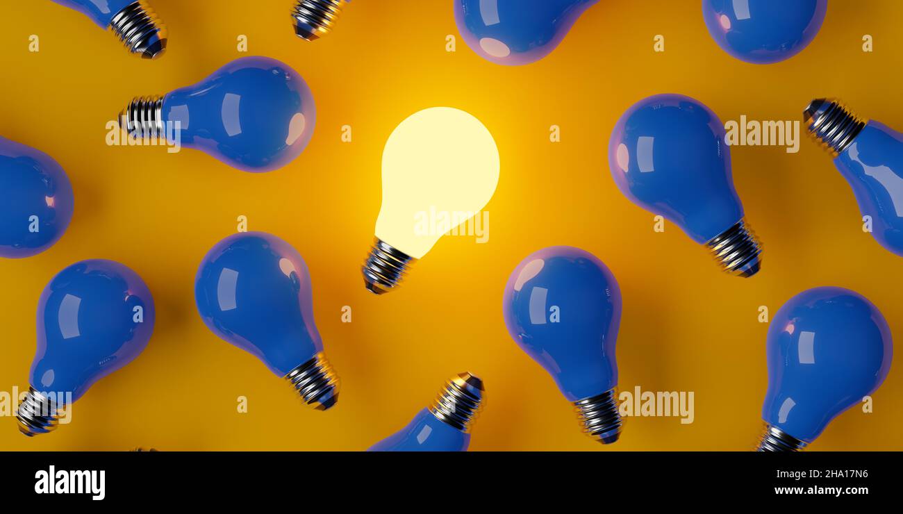 Single glowing lightbulb in group of blue bulbs over orange background ...
