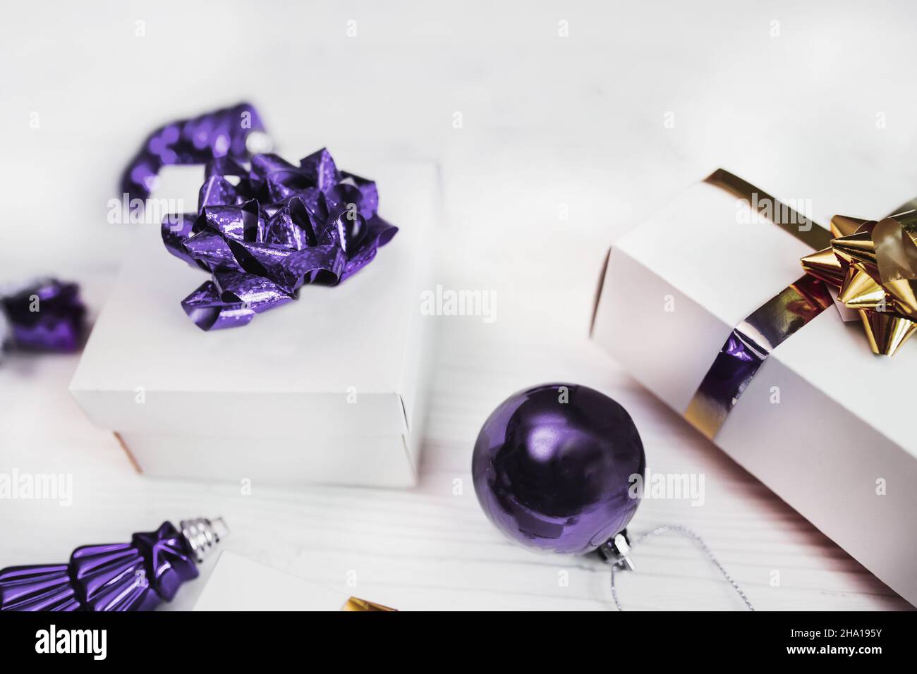 White gift boxes with Ribbons Very peri colors of the year 2022 ...