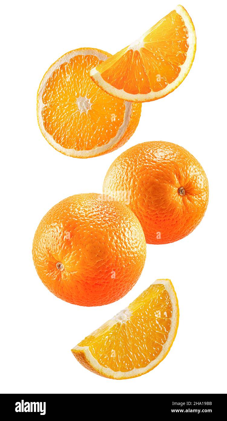 falling oranges isolated on a white background Stock Photo - Alamy