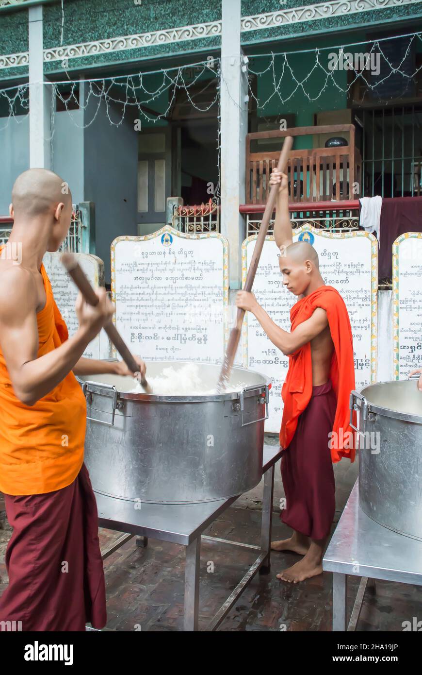 Monks Prepare Rice in Huge Pot Stock Photo - Alamy