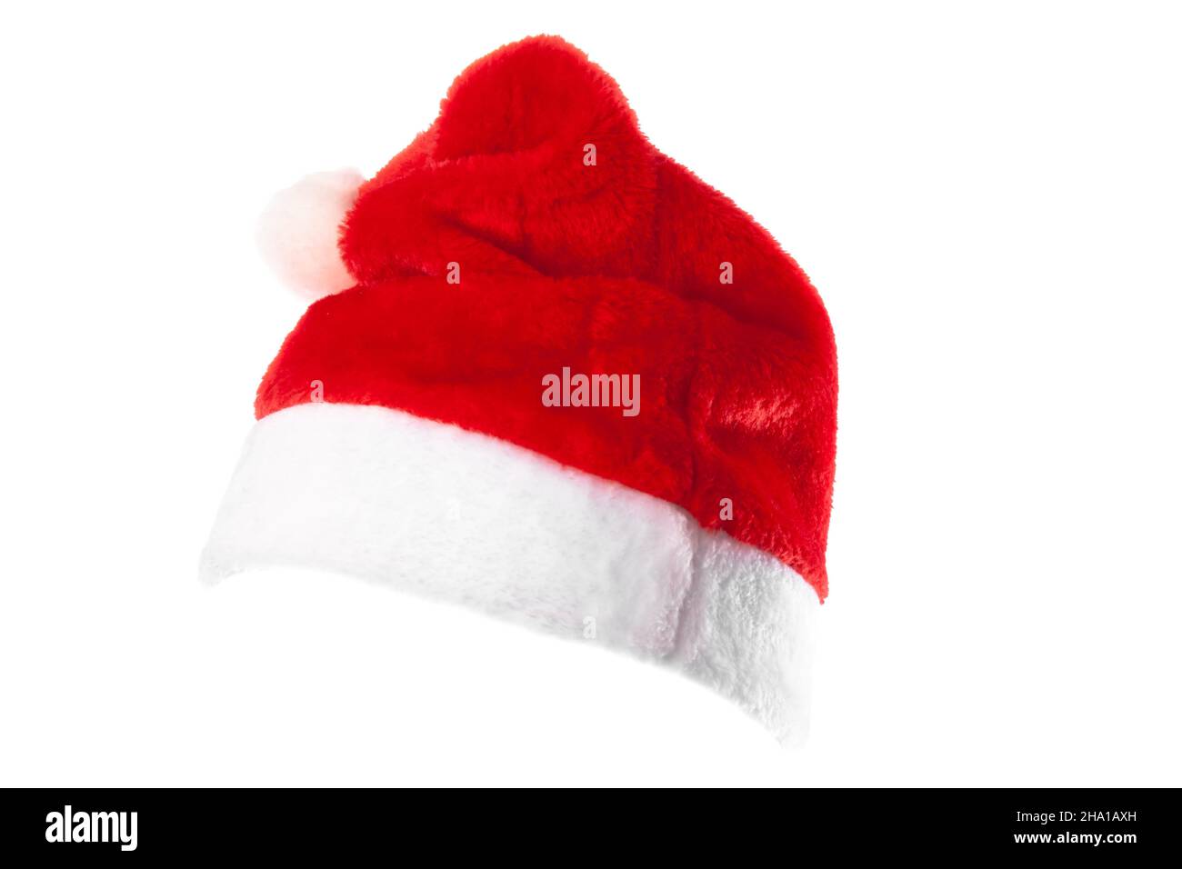 Red Christmas hat isolated on white background Stock Photo - Alamy