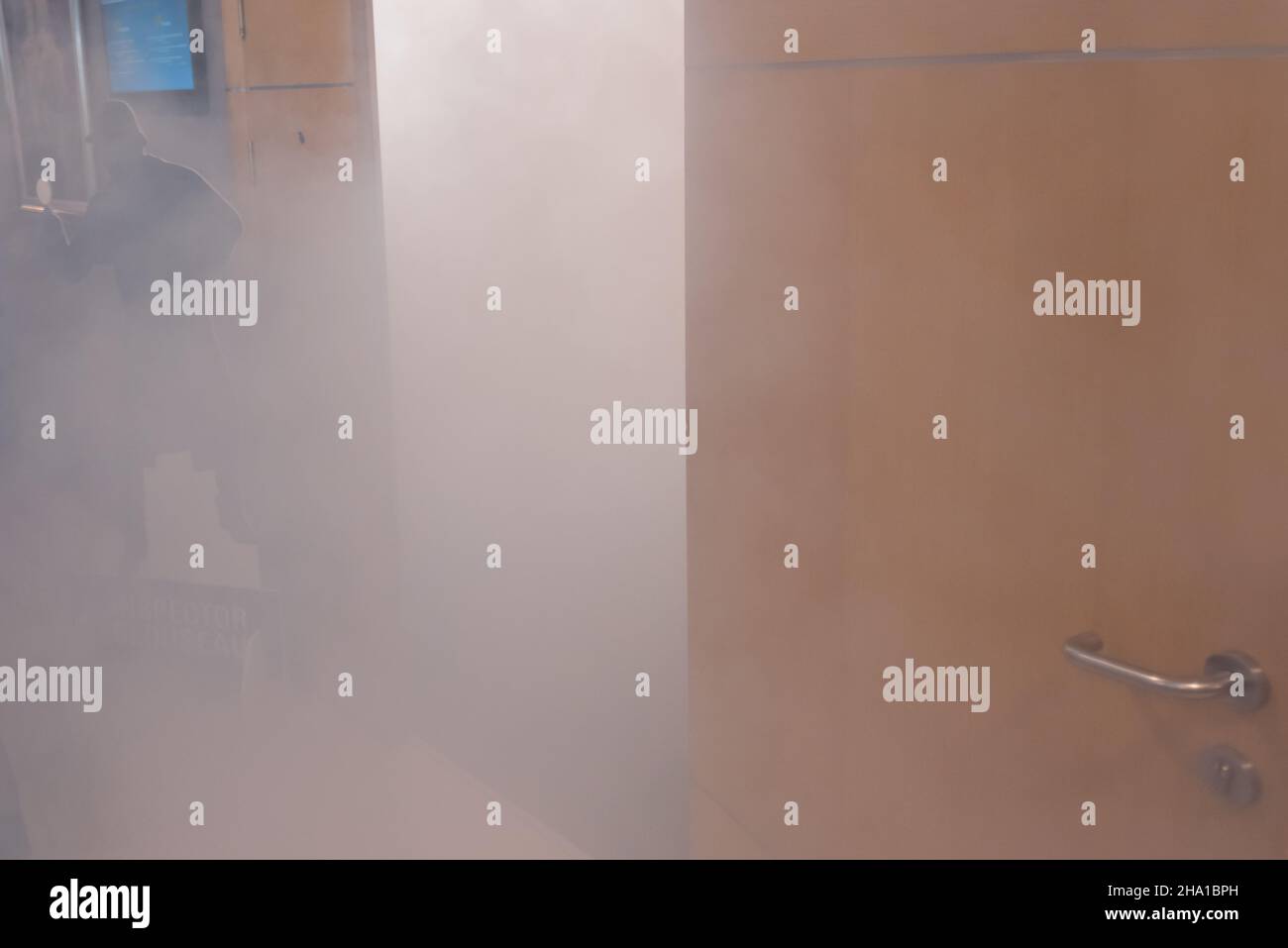 Smog and smoke in the office building - emergency exit Stock Photo - Alamy
