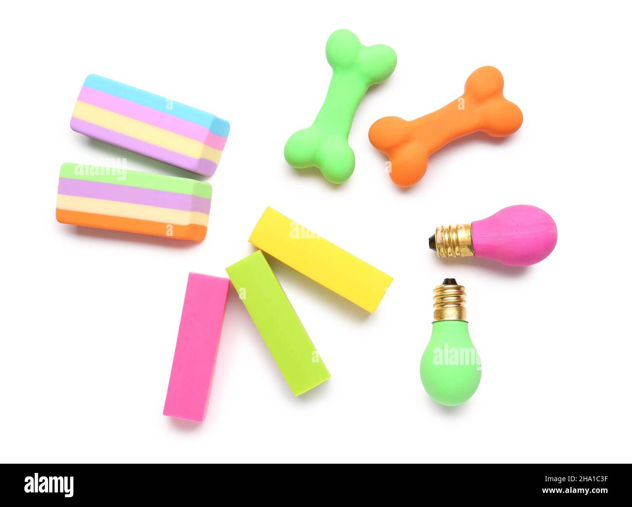 Different erasers on white background Stock Photo - Alamy