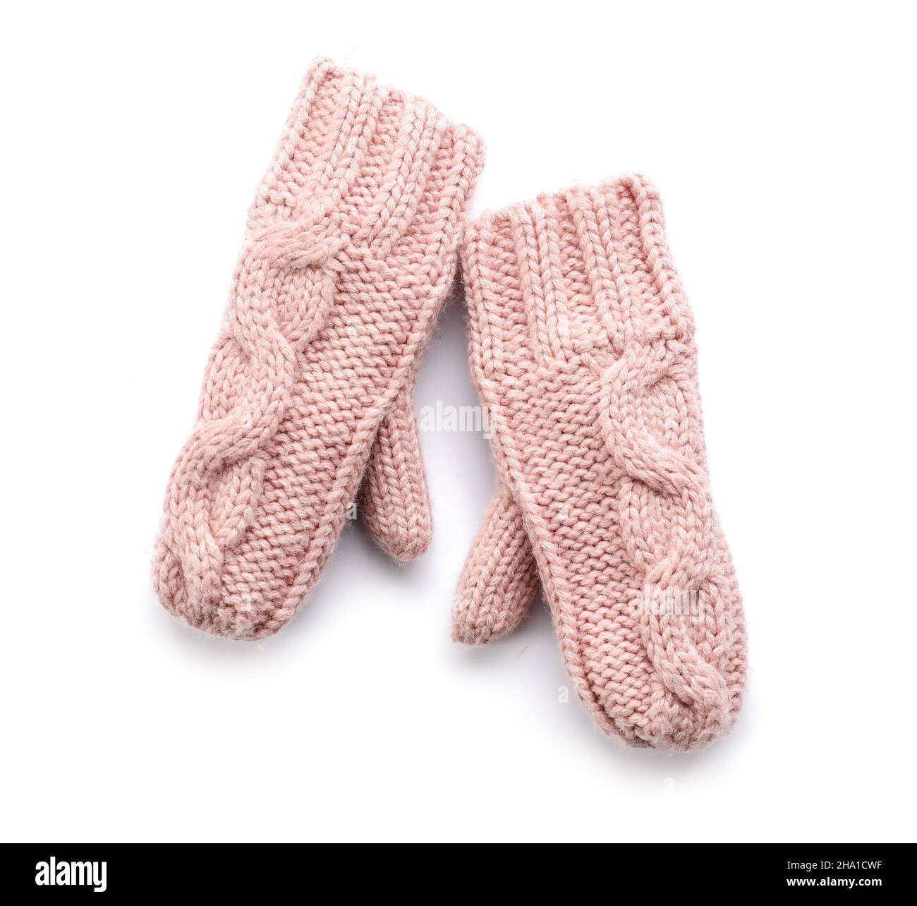 Knitted mittens on white background Stock Photo - Alamy