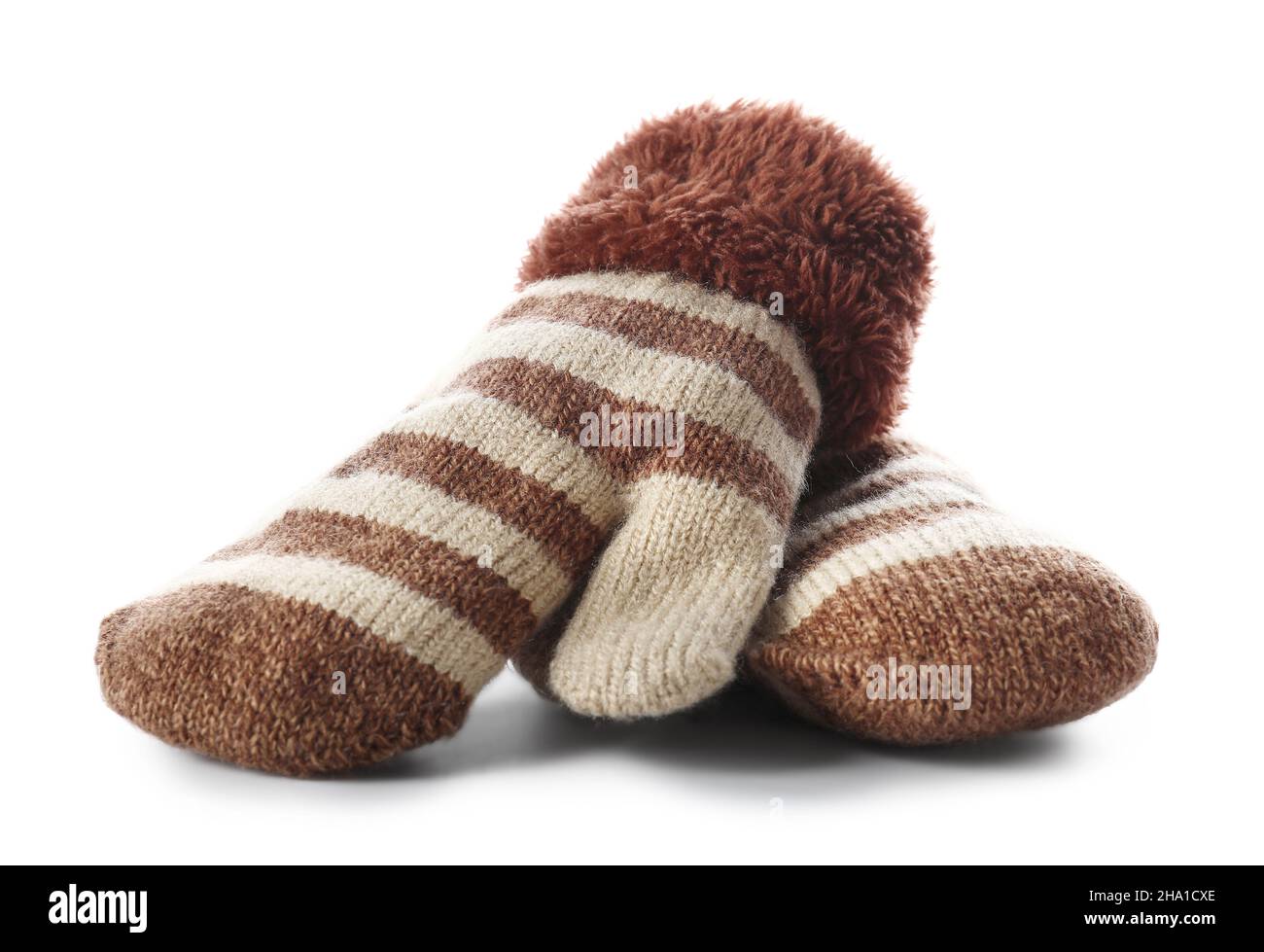 Winter mittens on white background, closeup Stock Photo - Alamy