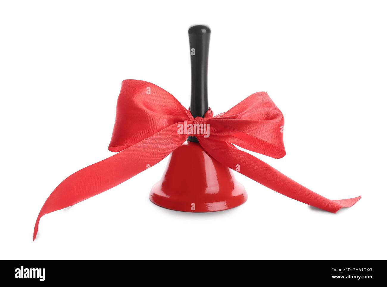 Christmas bell with red ribbon on white background Stock Photo - Alamy