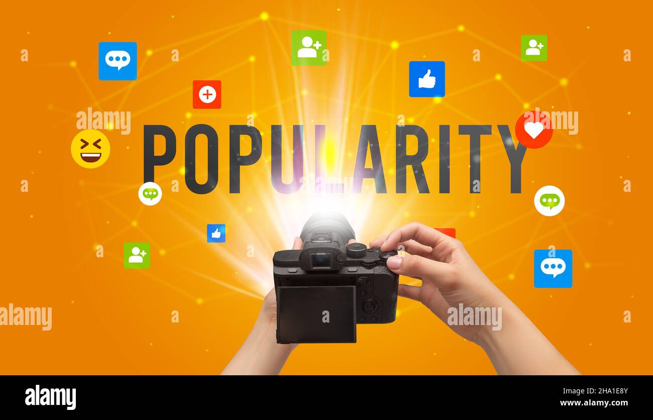 Using camera to capture social media content Stock Photo - Alamy