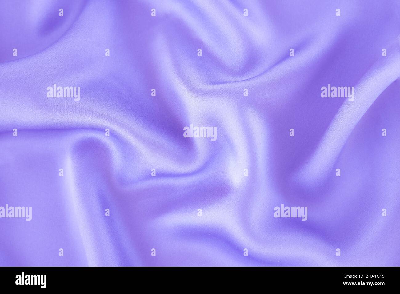 Violet lilac silk background. Color of the year Stock Photo - Alamy