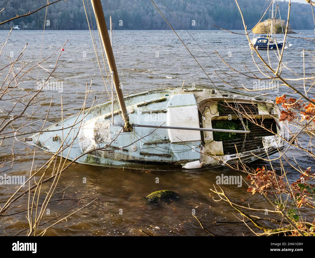 A sailboat ripped off its moorings and blown ashore by Storm Arwen, on ...