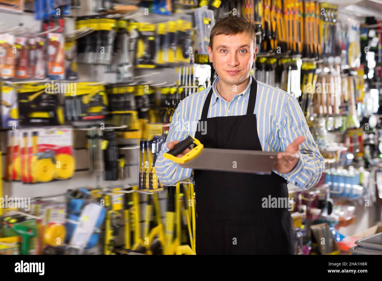 Ordinary professional man holding hi-res stock photography and images ...