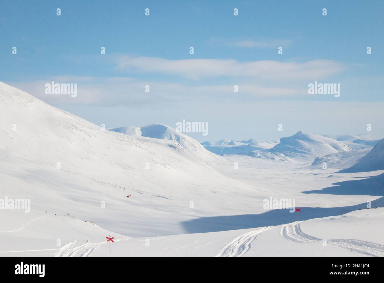 Kungsleden trail heading down into the valley towards Salka mountain ...