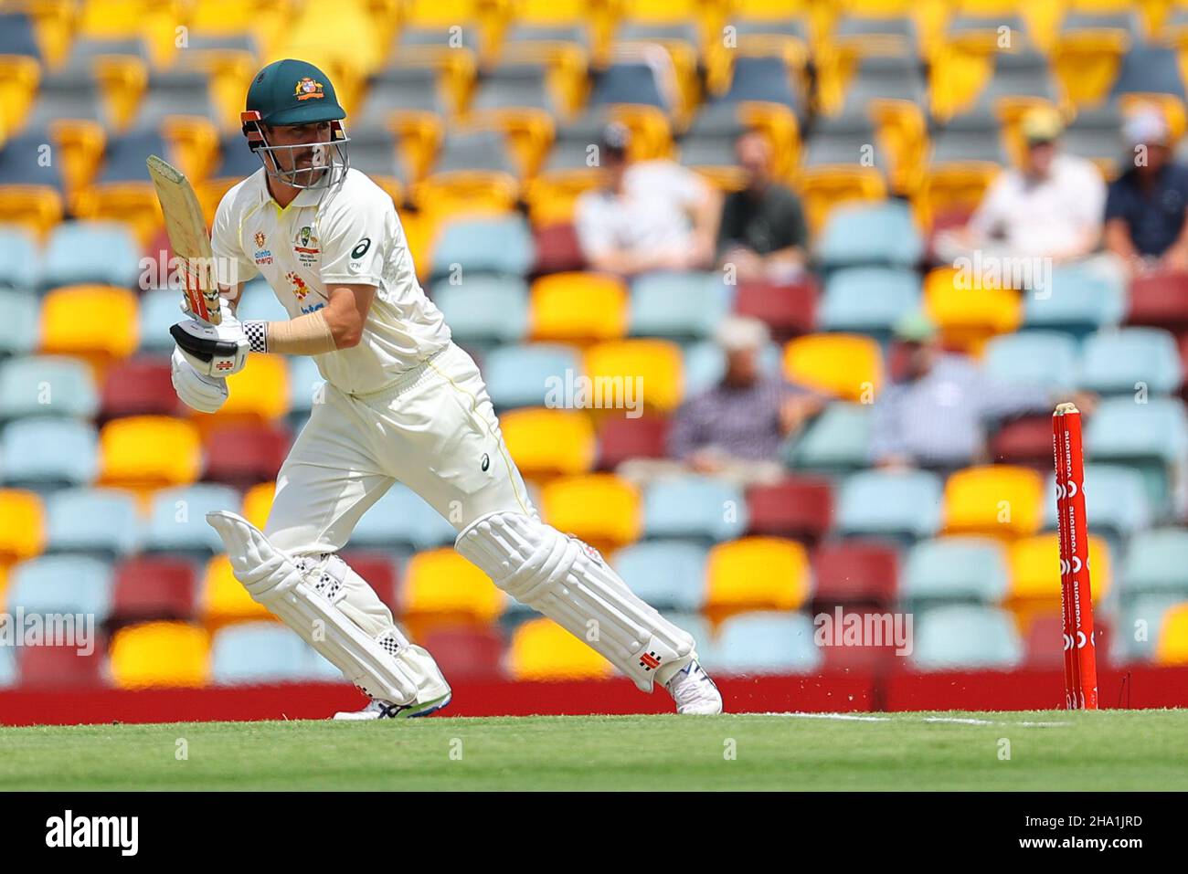 Travis Head of Australia plays a shot which is fielded by Ollie Pope of ...